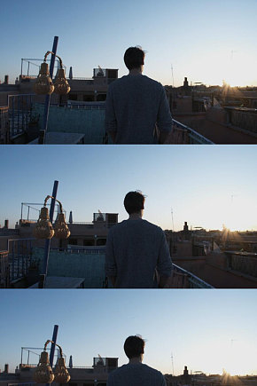 男人走在屋顶上看清晨日出实拍素材下载-众图网